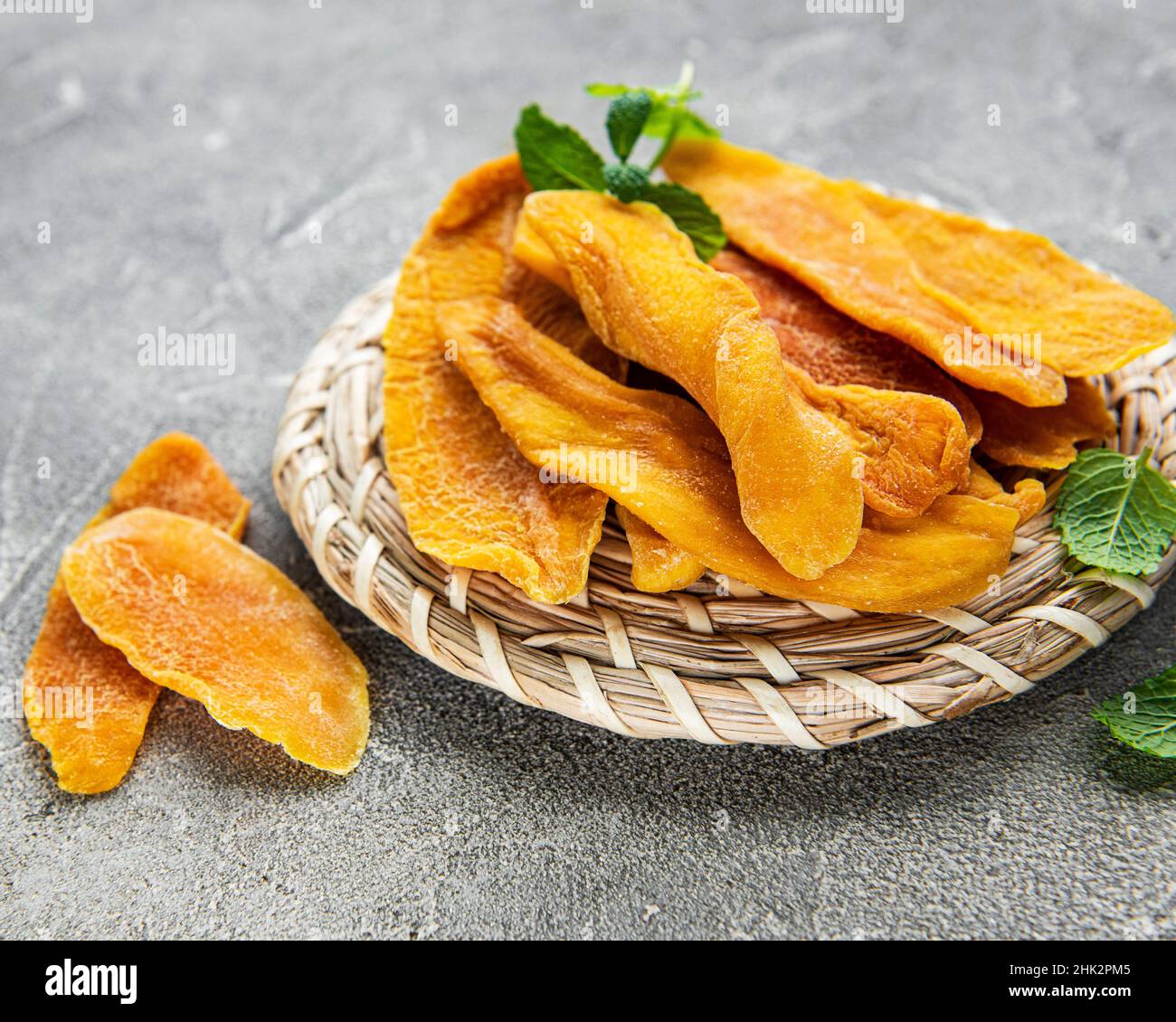 Dried Mango Fruit on grey concrete Background Stock Photo - Alamy