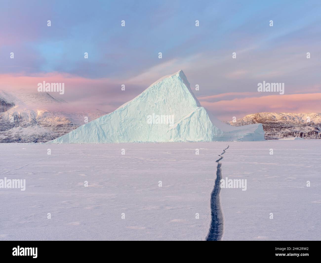 Icebergs in front of Storen Island, frozen into the sea ice of the ...