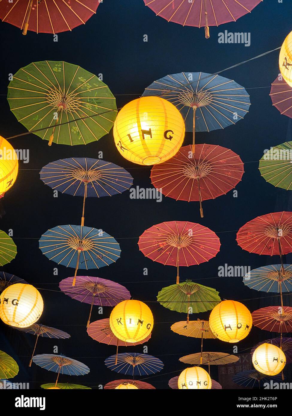 Beautiful colorful decorated ceiling with large colorful parasols ...