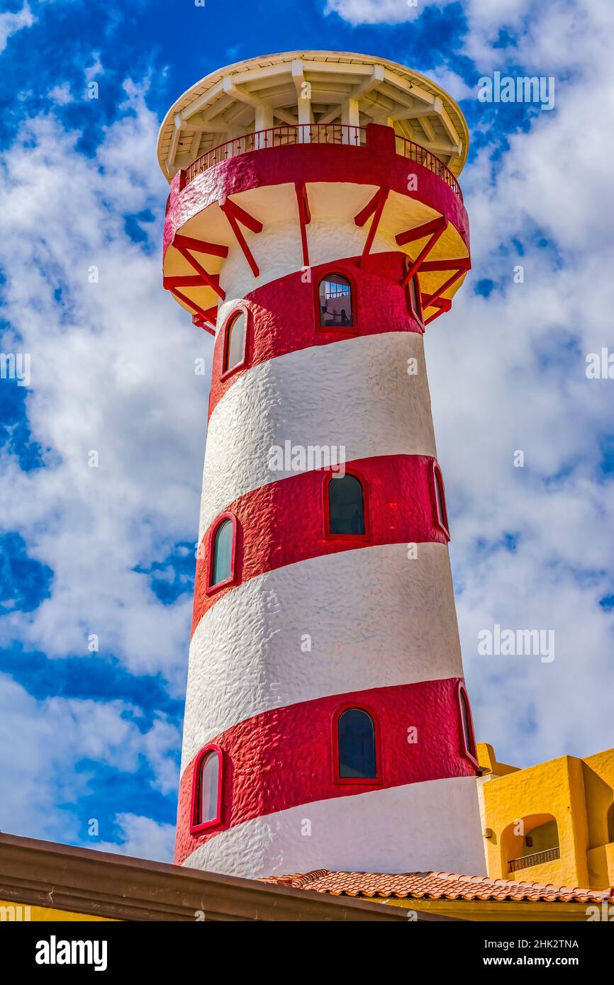Colorful lighthouse marina harbor, Cabo San Lucas, Baja Mexico Stock ...