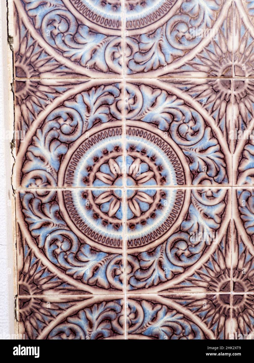 Portugal, Aveiro. Colorful azulejo tiles on the exterior wall of house ...