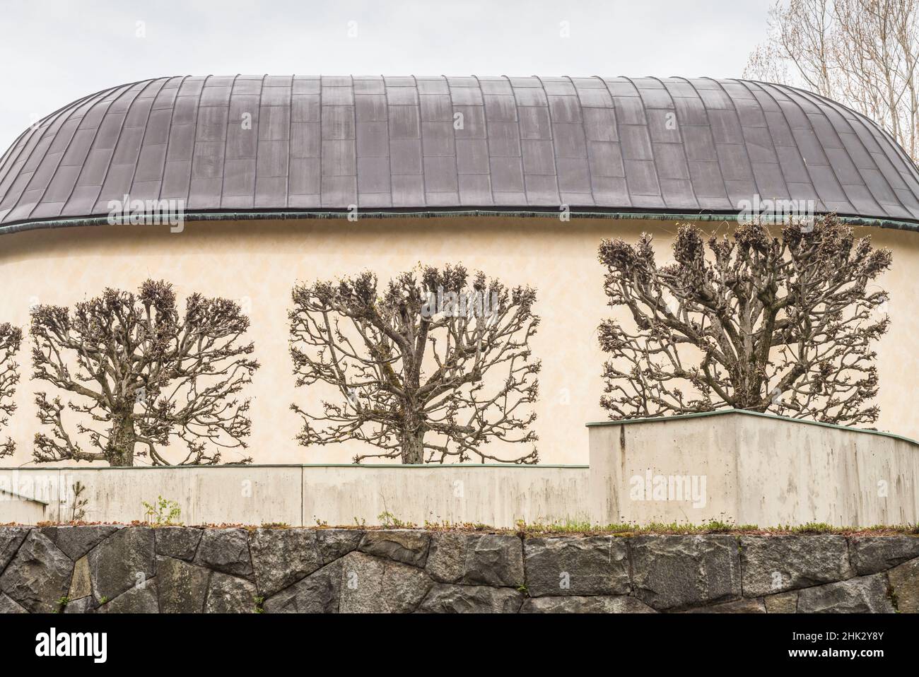 Sweden, Stockholm, Skogskyrkogarden Cemetery, chapel and trees Stock ...