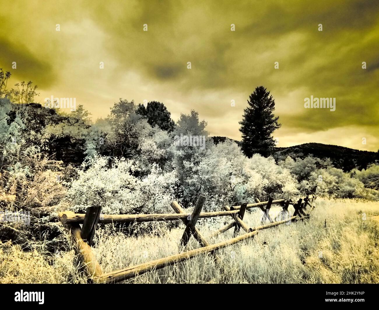 USA, Utah, Infrared of the Logan Pass area with split rai fence Stock ...