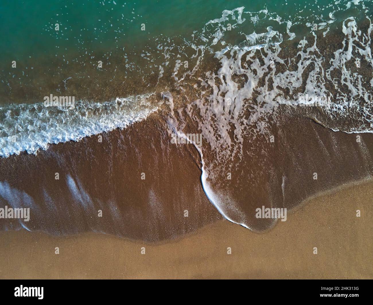 Aerial view of sandy beach and sea with waves, Top view, amazing nature ...