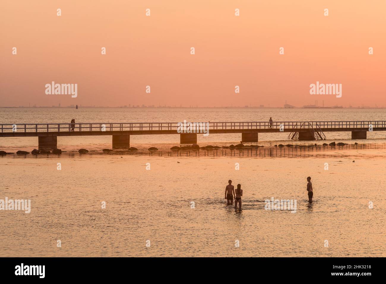 Sweden, Scania, Malmo, Riberborgs Stranden beach area, pier at sunset ...