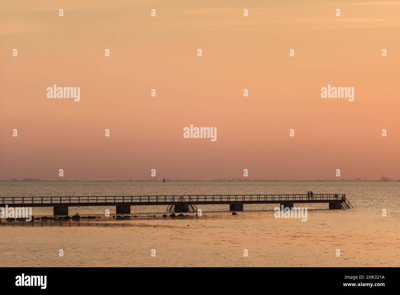 Sweden, Scania, Malmo, Riberborgs Stranden beach area, pier at sunset ...
