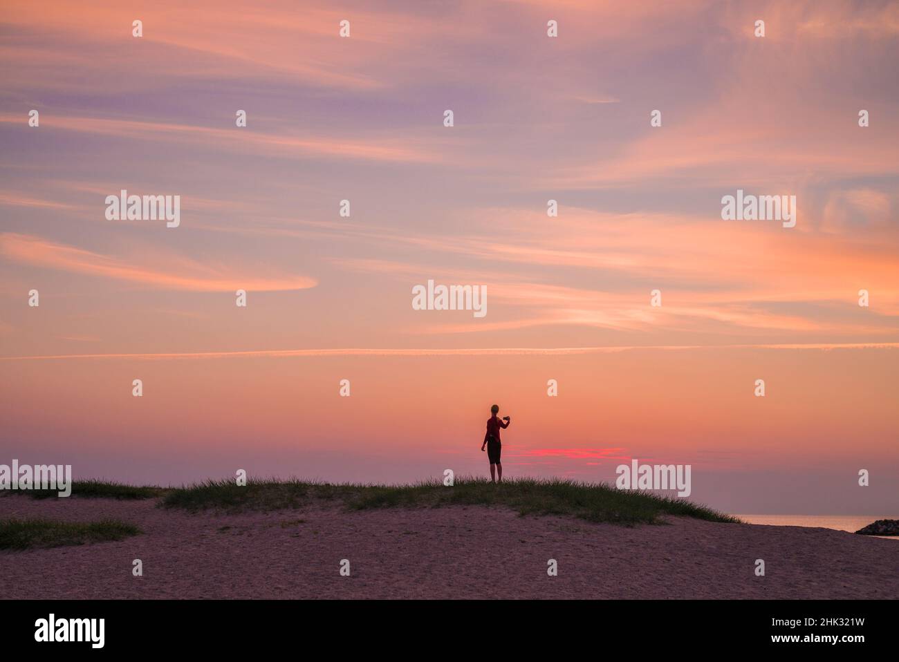 Sweden, Scania, Malmo, Riberborgs Stranden beach area, woman ...