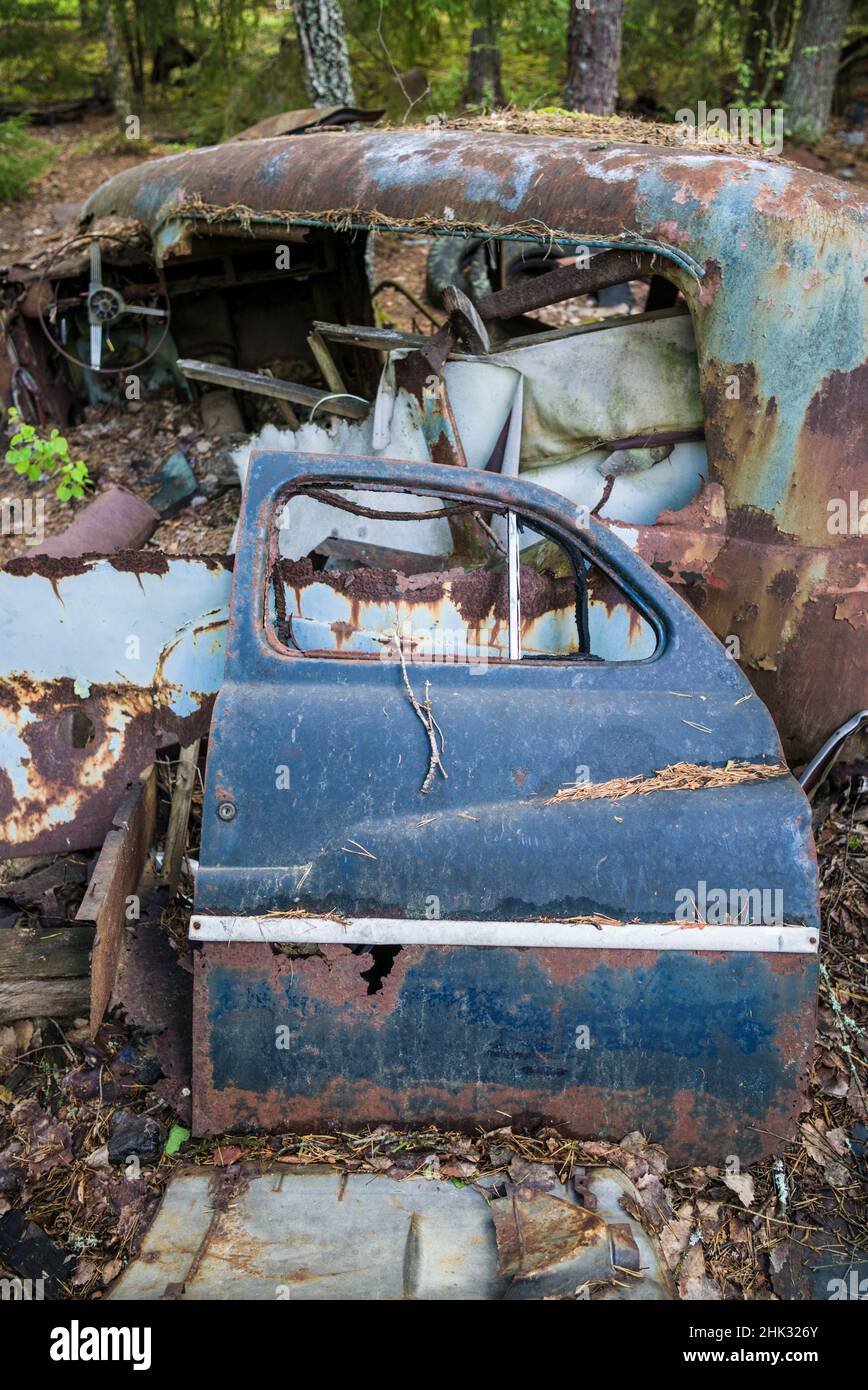 Sweden, Smaland, Ryd, Kyrko Mosse Car Cemetery, former junkyard now pubic park, junked cars ...