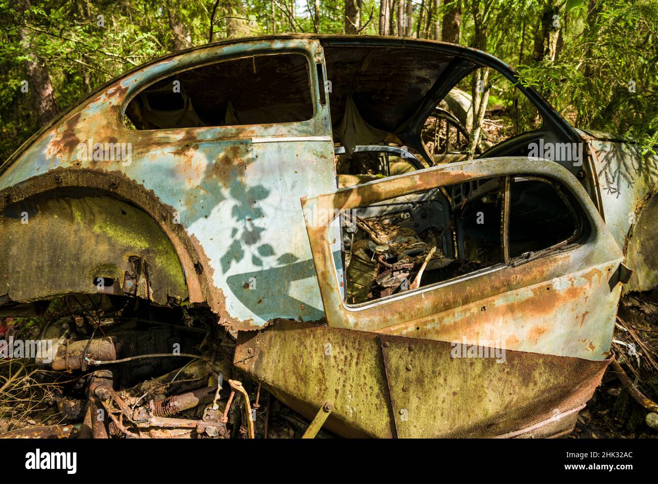 Sweden, Smaland, Ryd, Kyrko Mosse Car Cemetery, former junkyard now pubic park, junked cars ...