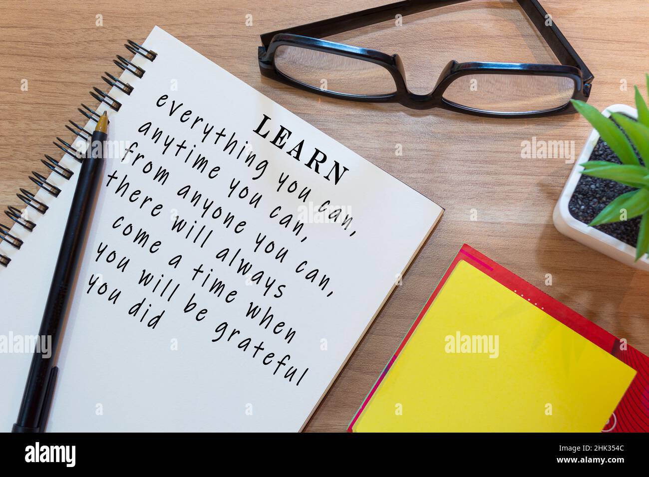 Motivational and inspirational quote on notepad with yellow note ...