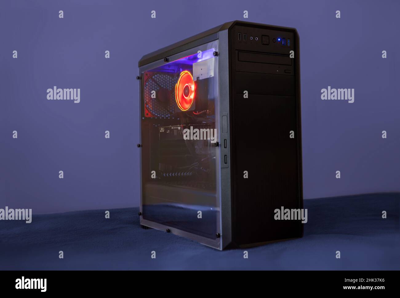 Gaming computer with LEDs on a desk Stock Photo - Alamy
