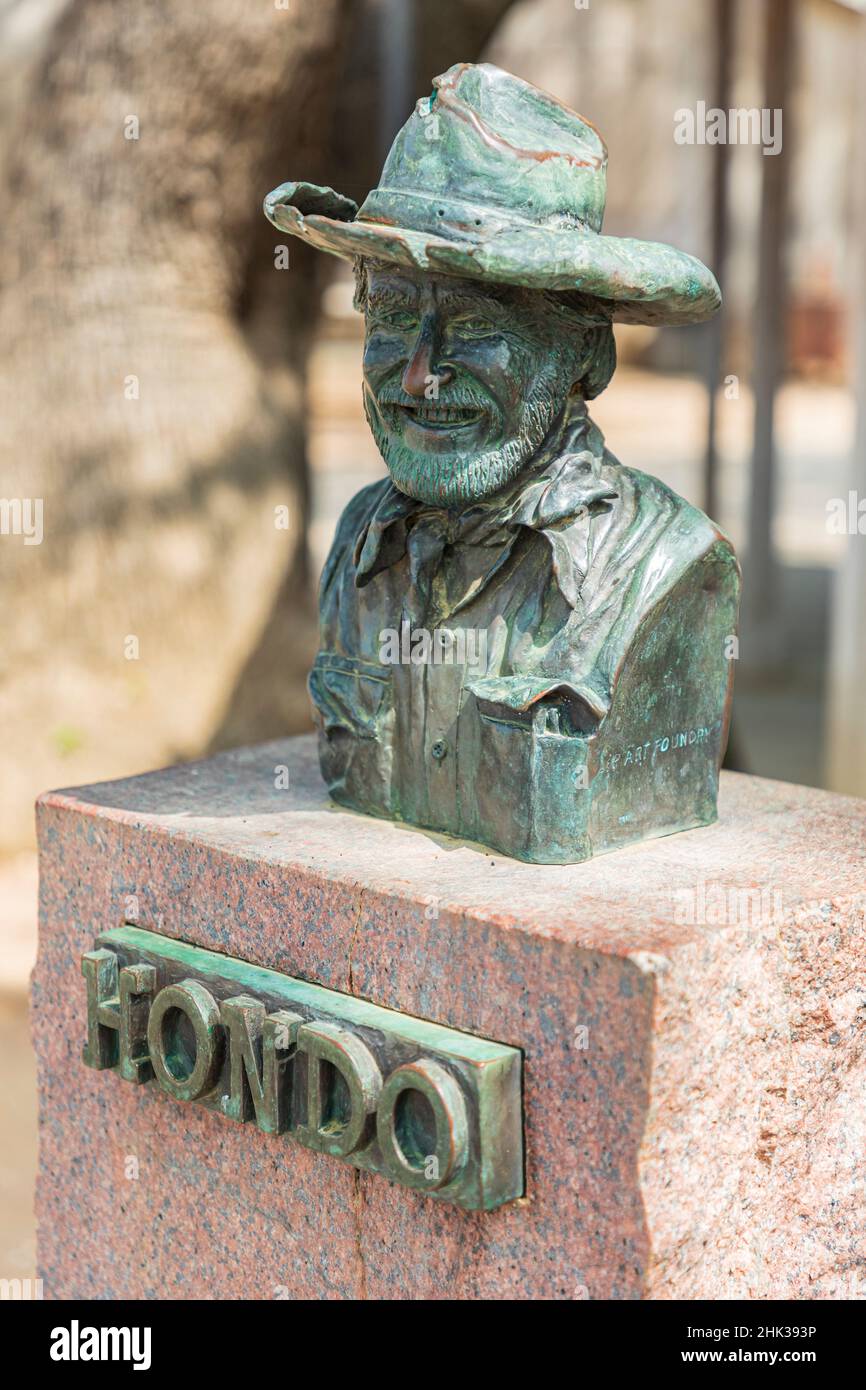 Luckenbach, Texas, USA. Statue of Hondo Crouch outside the post office ...