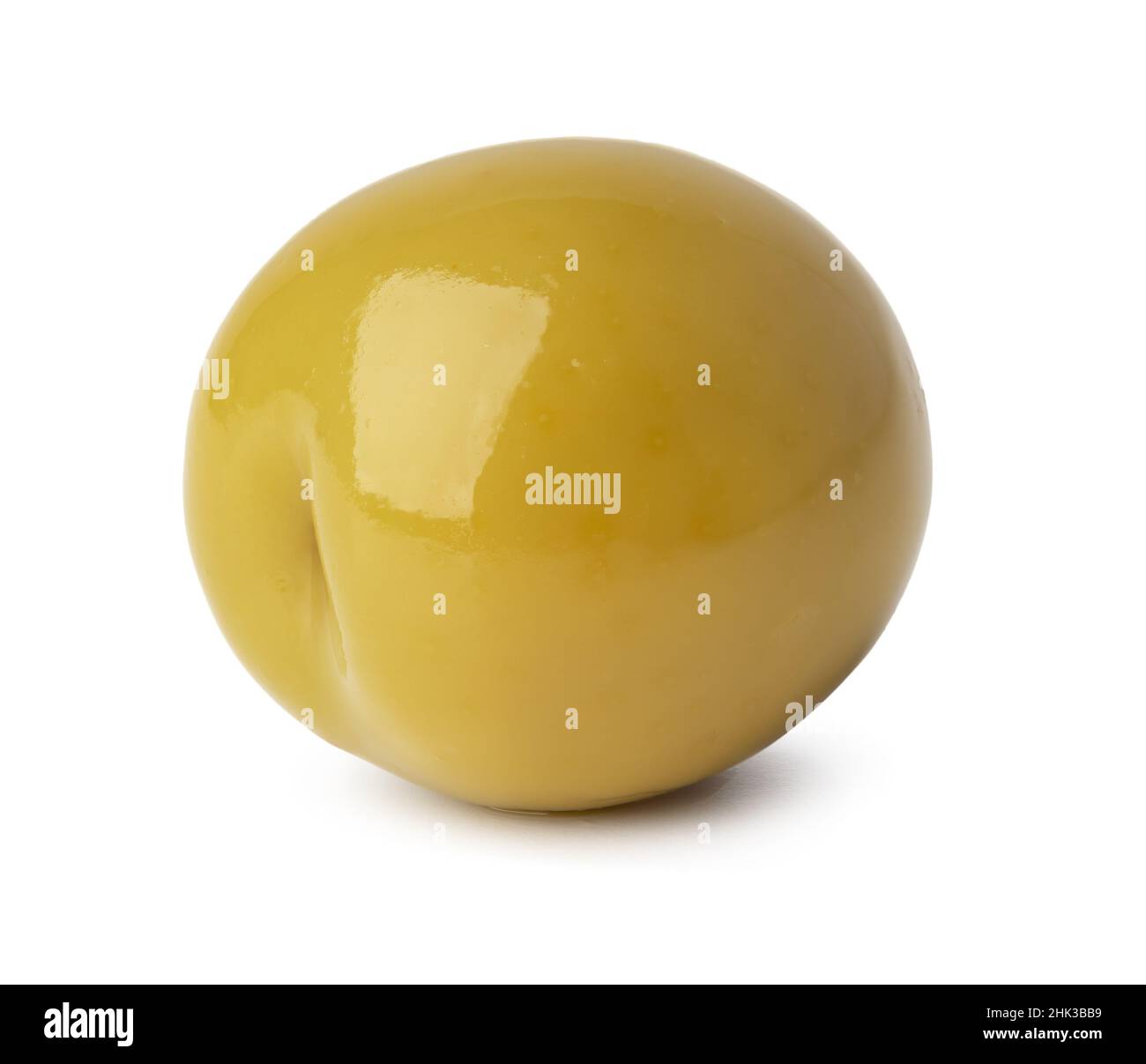 Single green olive isolated on white background Stock Photo - Alamy