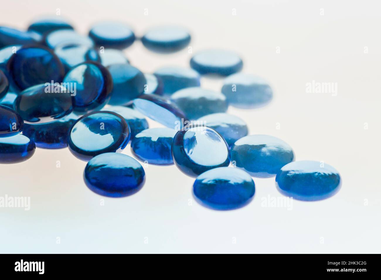 Glass Pebbles with light Stock Photo - Alamy