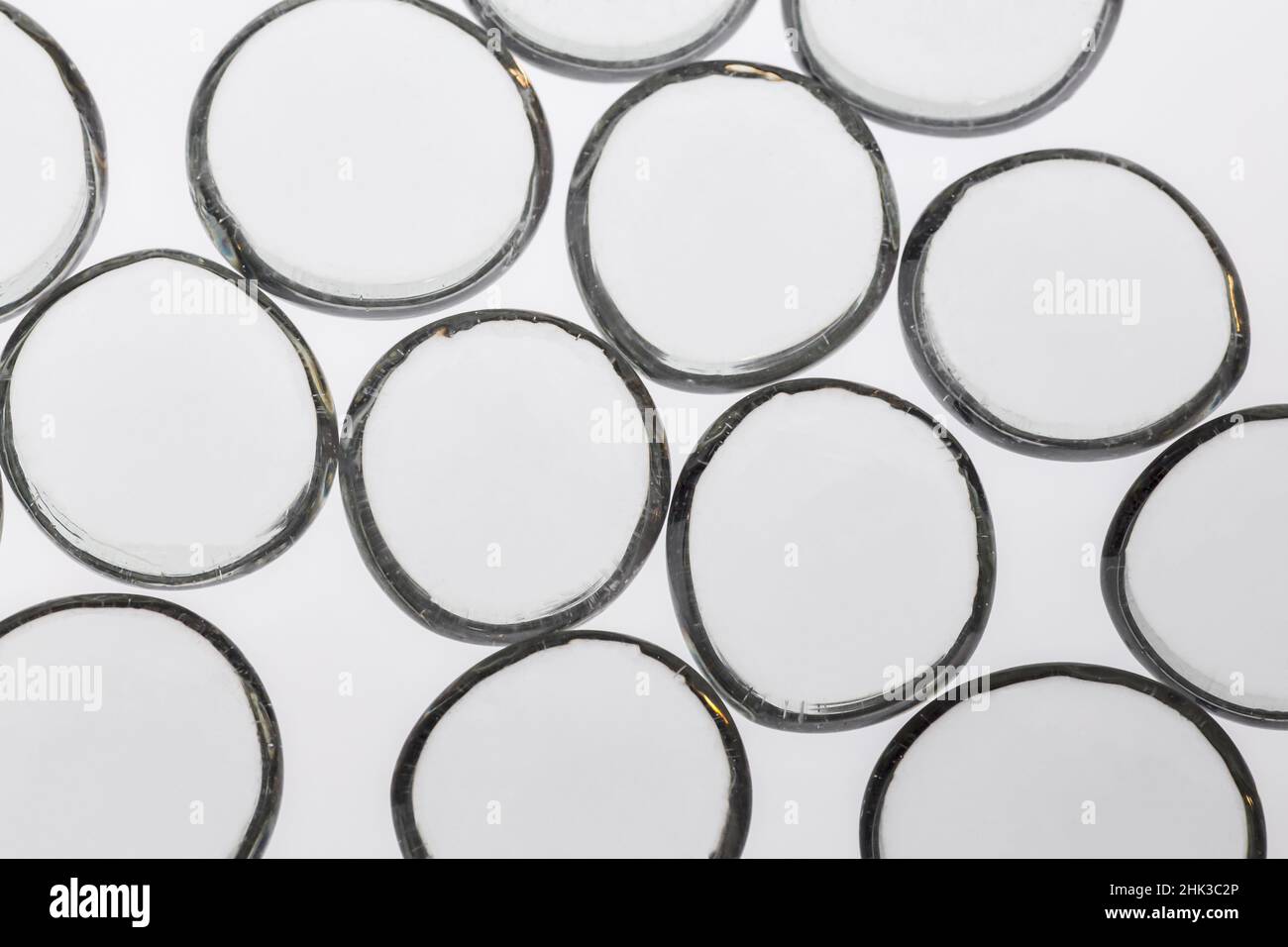 Clear Glass Pebbles with light Stock Photo - Alamy