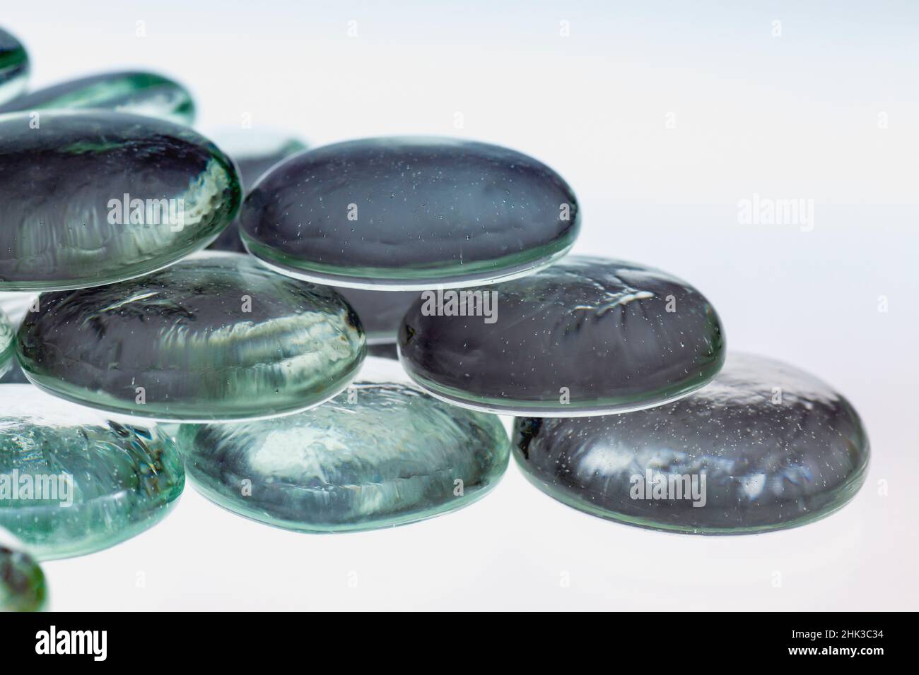 Clear Glass Pebbles with light Stock Photo - Alamy