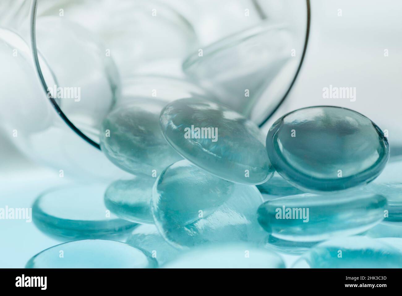 Clear Glass Pebbles with light Stock Photo - Alamy