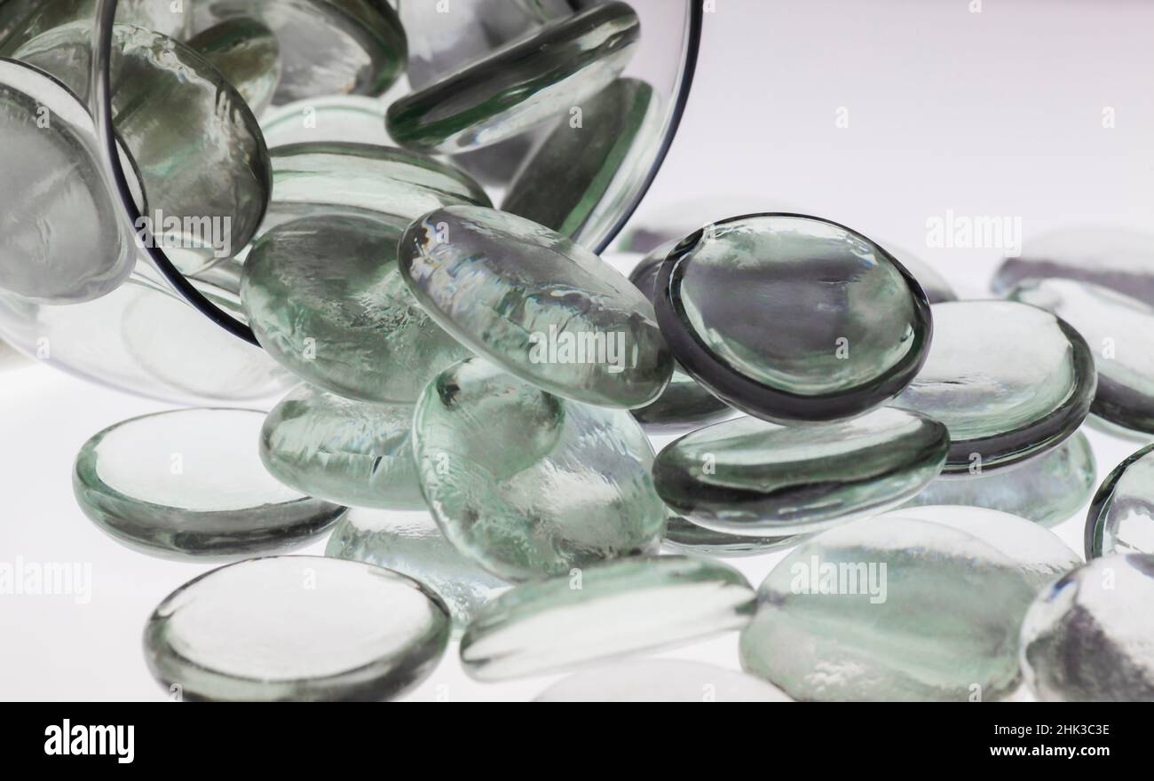 Clear Glass Pebbles with light Stock Photo - Alamy
