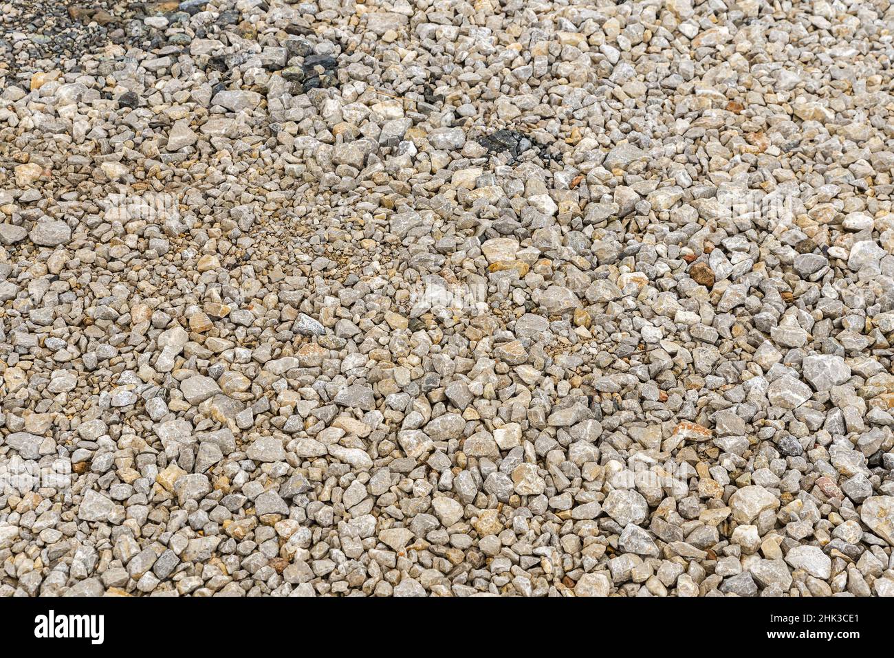 Yellow cobblestone forms background Stock Photo - Alamy