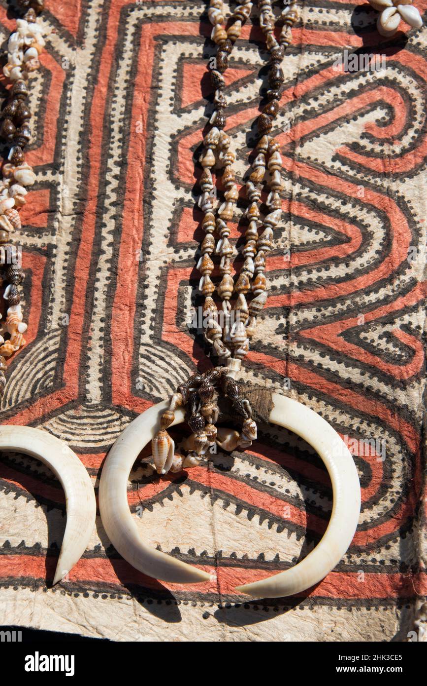 Papua New Guinea, Tufi. Shell necklaces with boar tusks on traditional ...