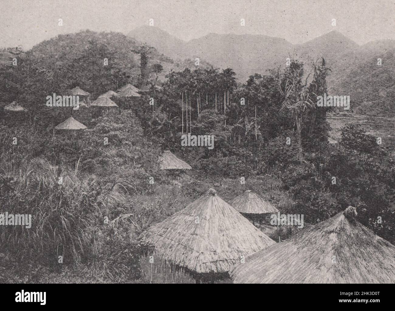 Grass-Roofed dwellings among Luzon's well-wooded heights. Philippines ...