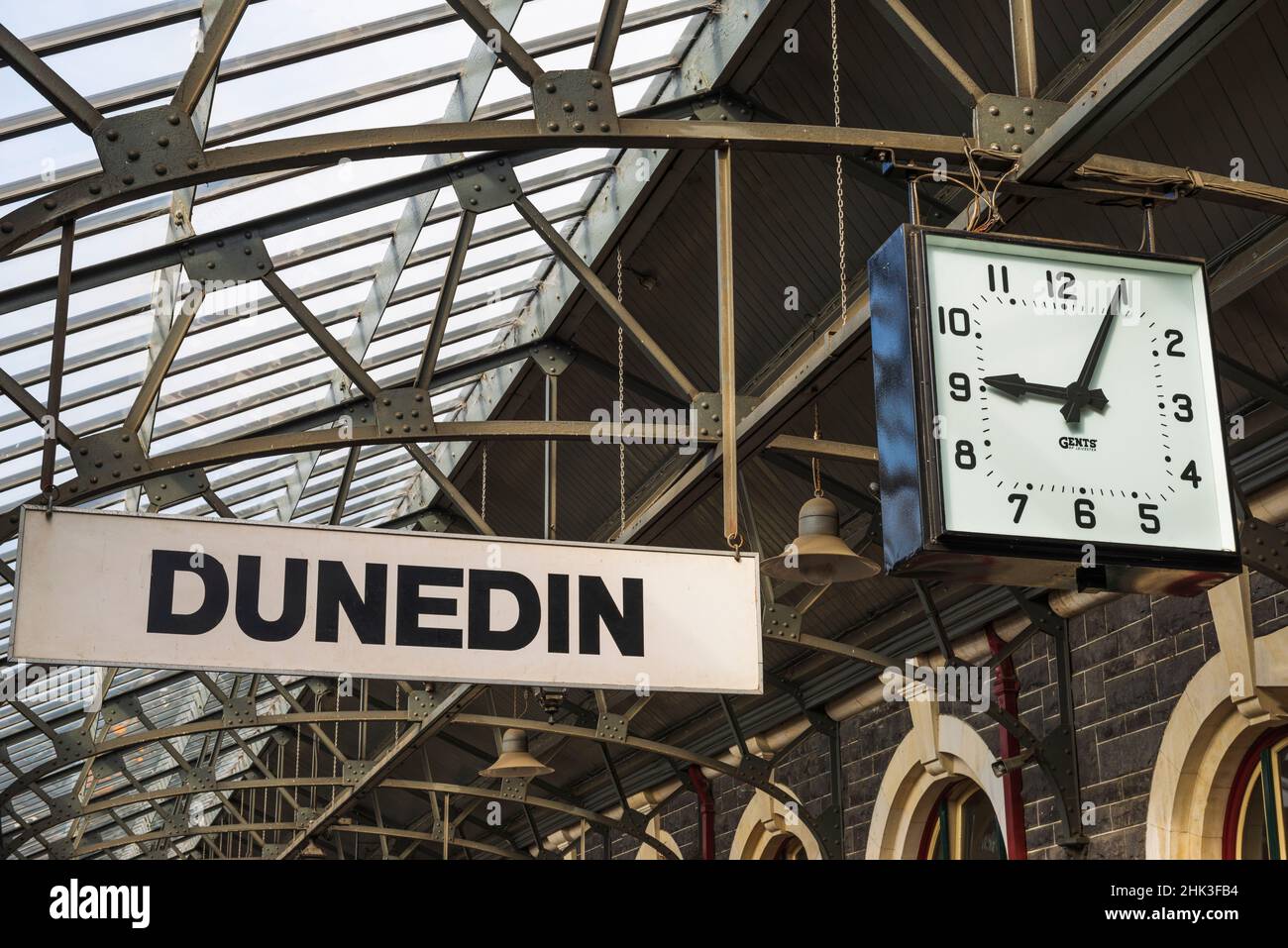 Clock and town sign at the Dunedin Railway Station, Otago, South Island ...
