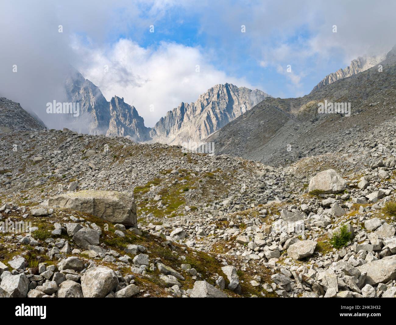 View towards Cima Presanella draped in clouds near Rifugio Segantini ...