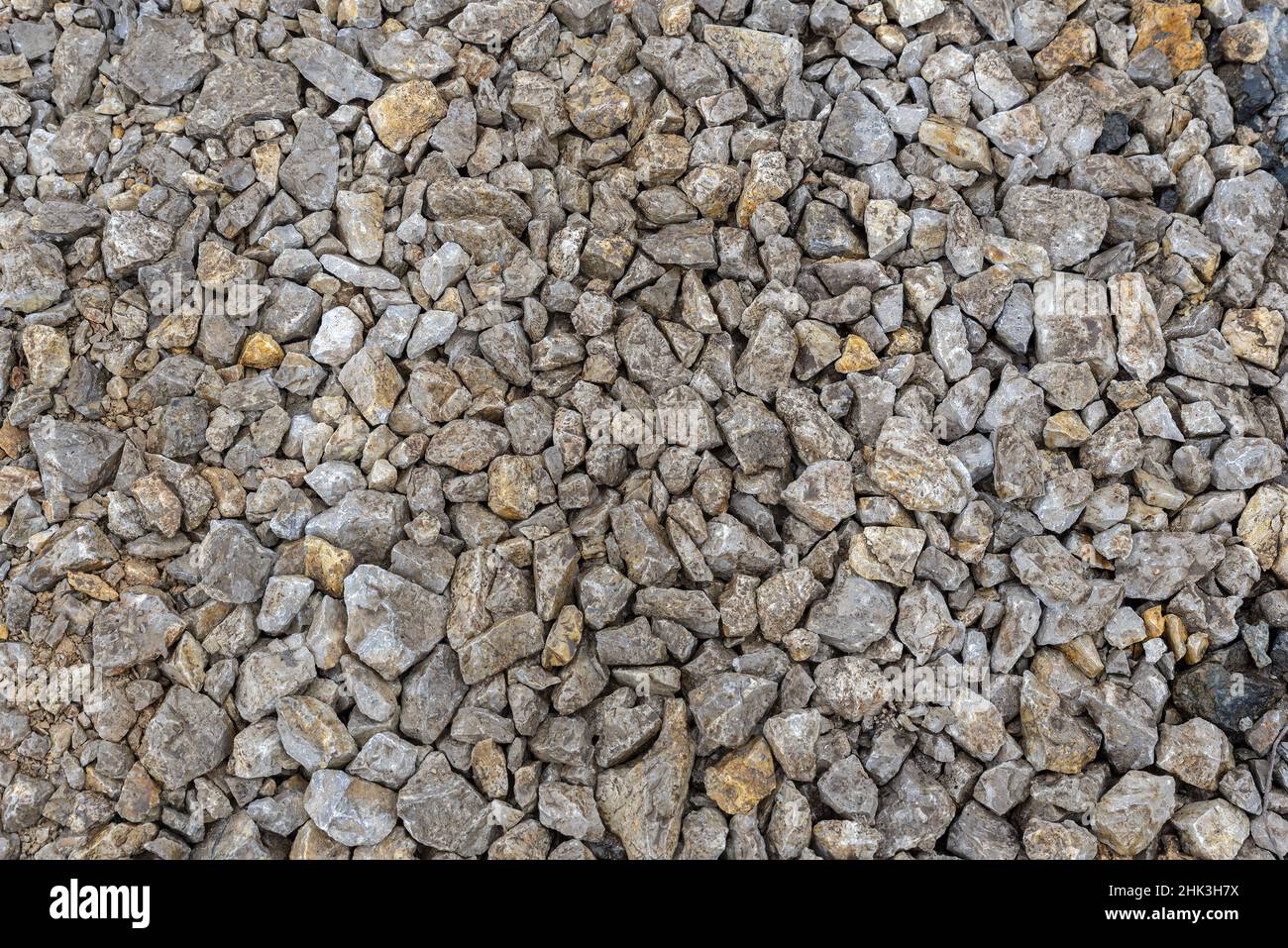 Gray cobblestone forms background Stock Photo - Alamy