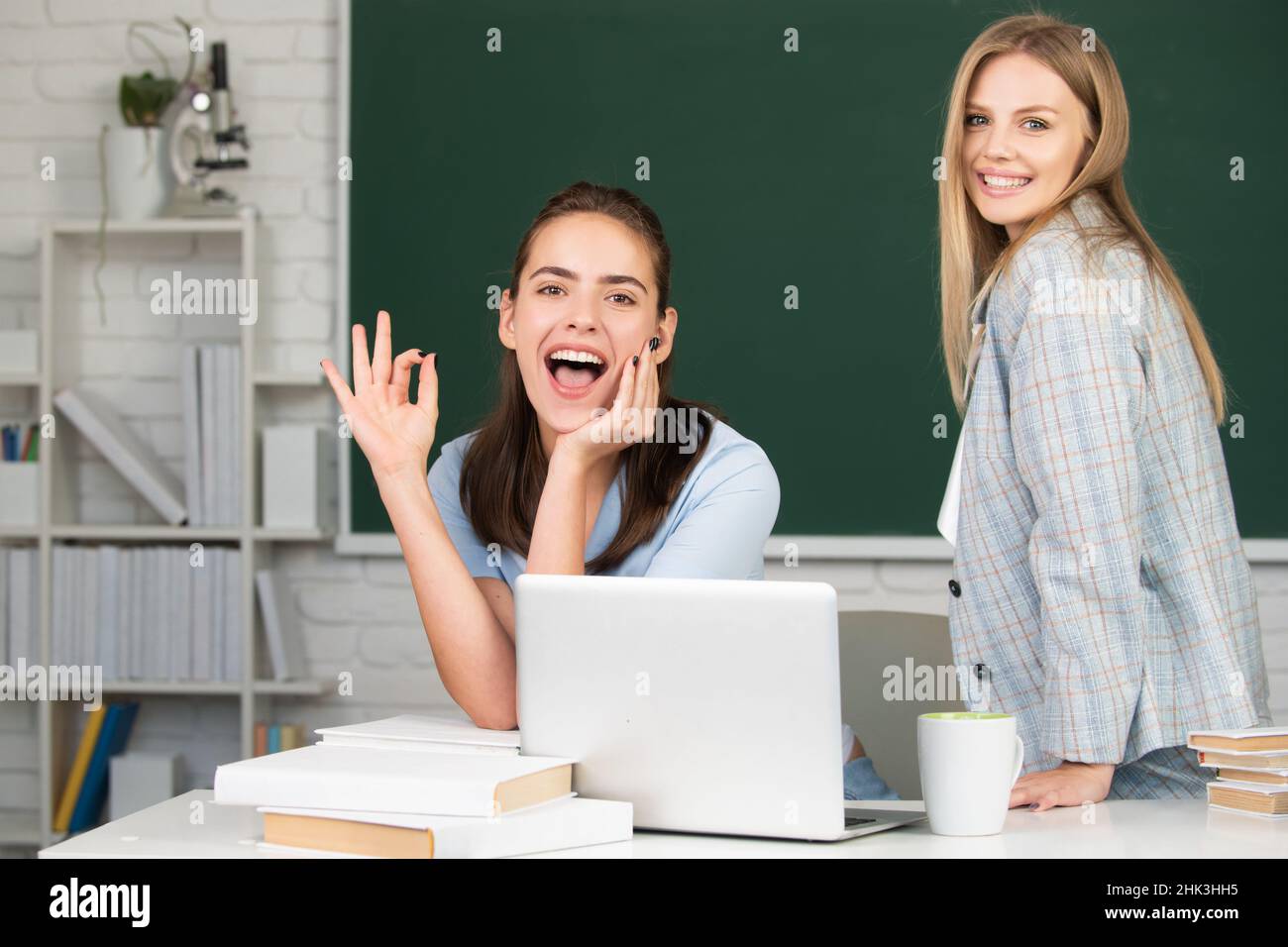 Students girls study together in classroom at college Stock Photo - Alamy