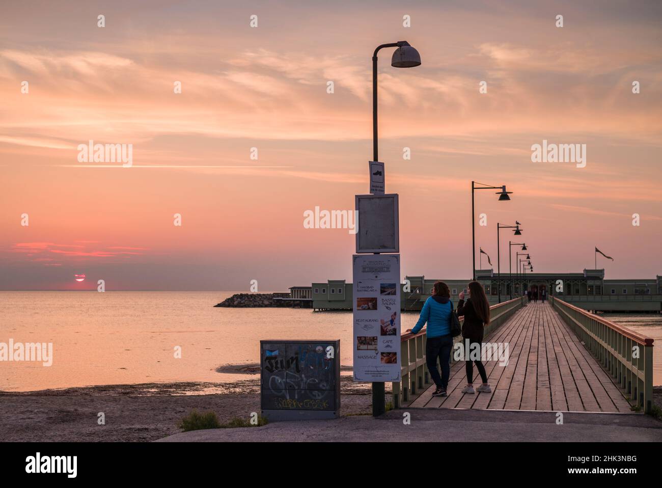 Sweden, Scania, Malmo, Riberborgs Stranden beach area, pier at sunset ...