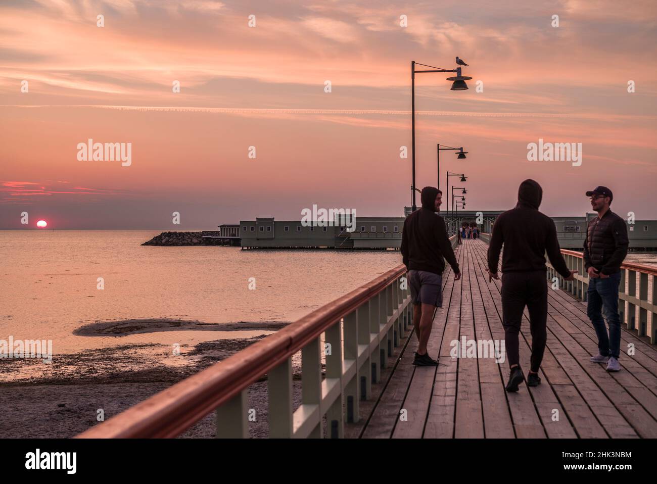Sweden, Scania, Malmo, Riberborgs Stranden beach area, pier at sunset ...