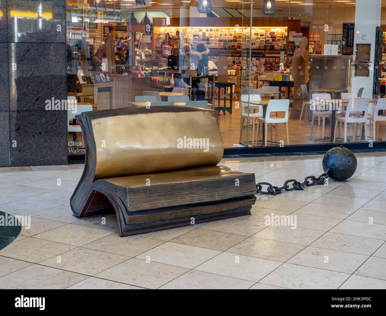 Sitting On History, a book based sculpture by Bill Woodrow, outside ...