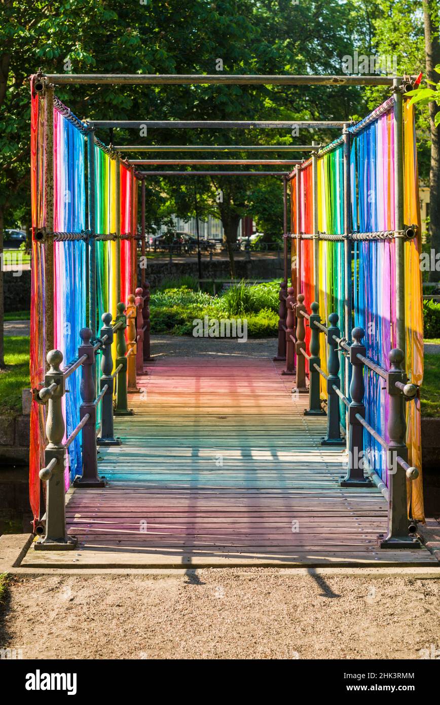 Sweden, Narke, Orebro, Slottsparken park, park bridge draped with ...