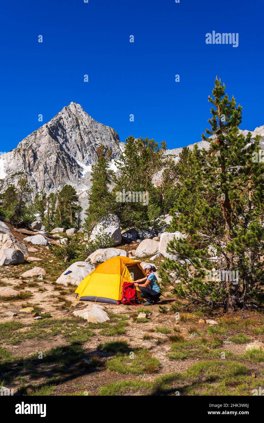 Backpacker and tent under the Sierra Crest, John Muir Wilderness ...