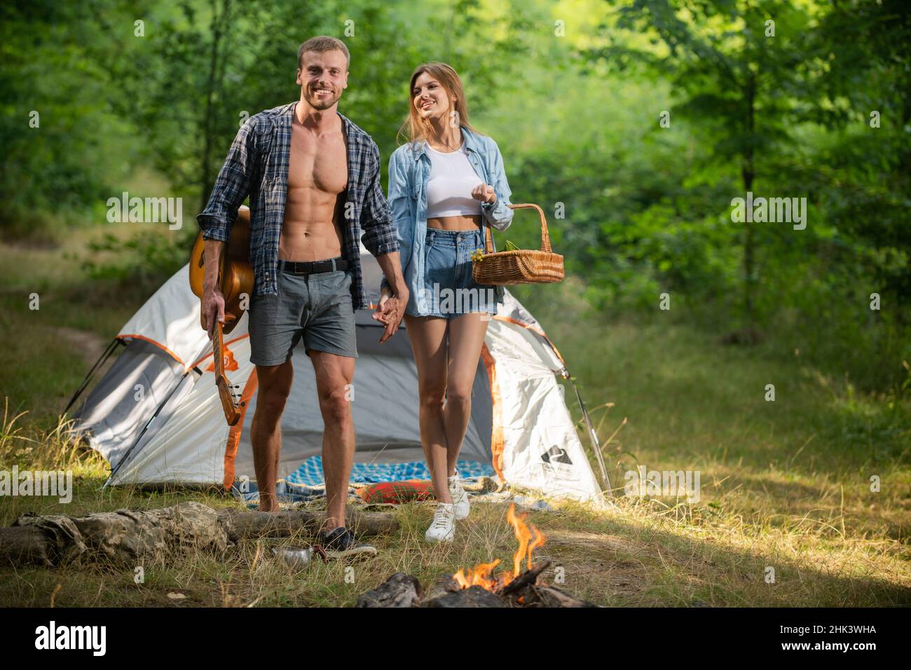 Romantic couple camping on nature background. Adventure for young ...