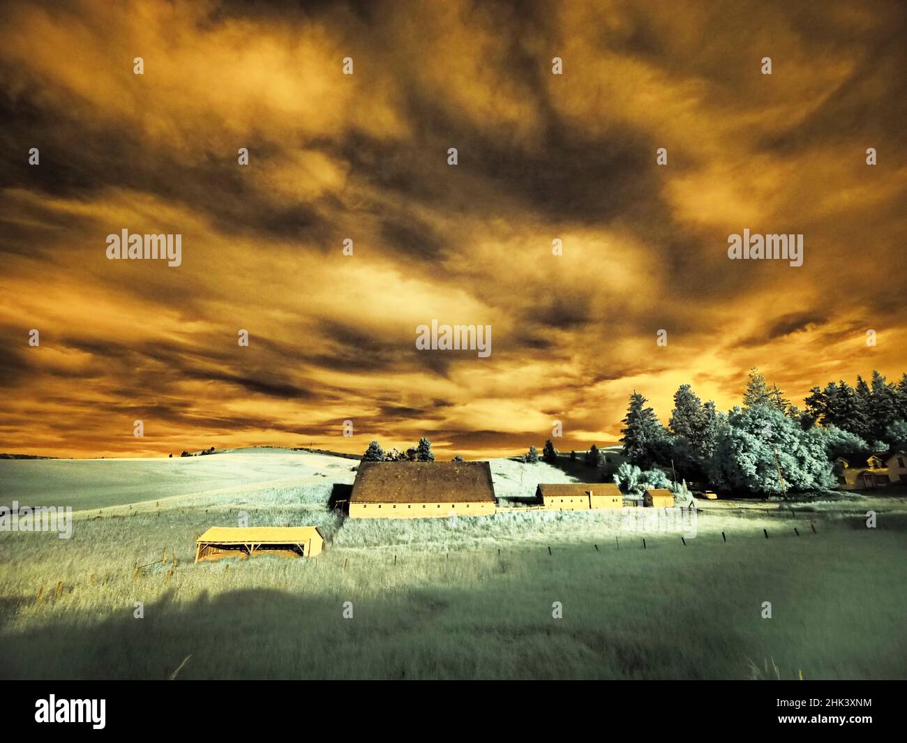 USA, Washington State, Palouse. Barn and out buildings with thunder ...