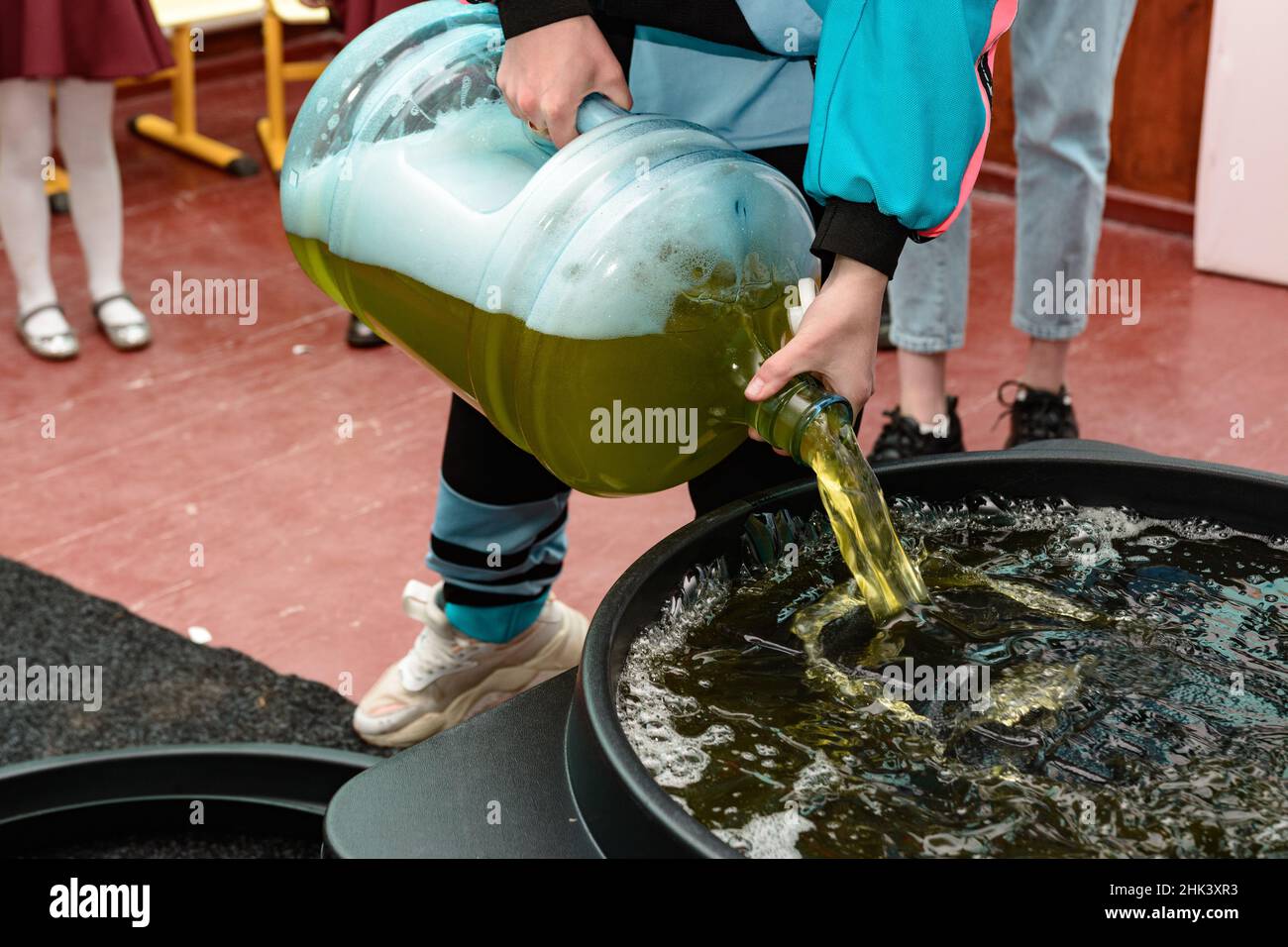 Soap solution for the holiday with soap bubbles close up, soap solution ...