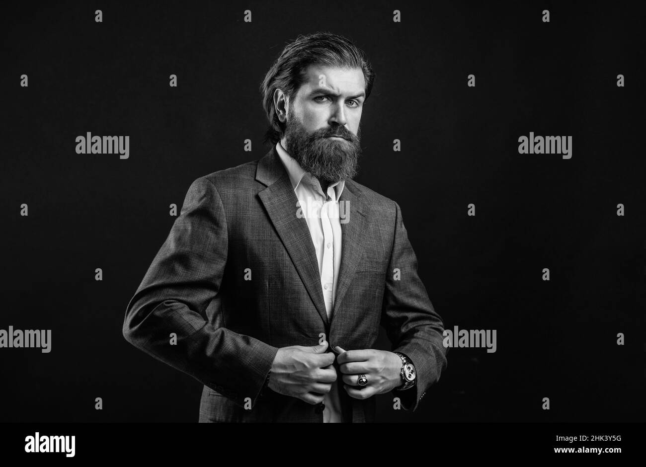 Man with beard wear grey suit corporate style, fashion stylist concept ...