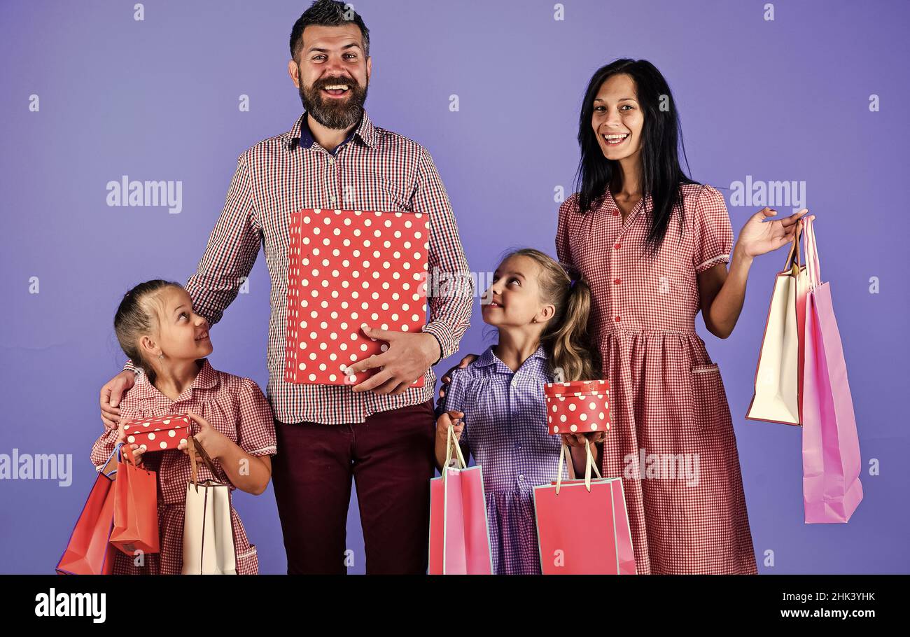 happy family go shopping together hold packages, shop Stock Photo - Alamy