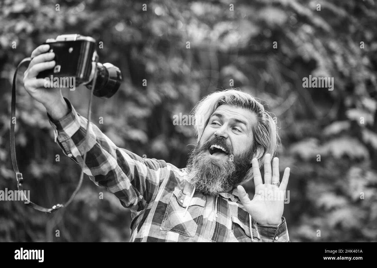Hobby and professional occupation. Photographer and vintage camera. Man ...