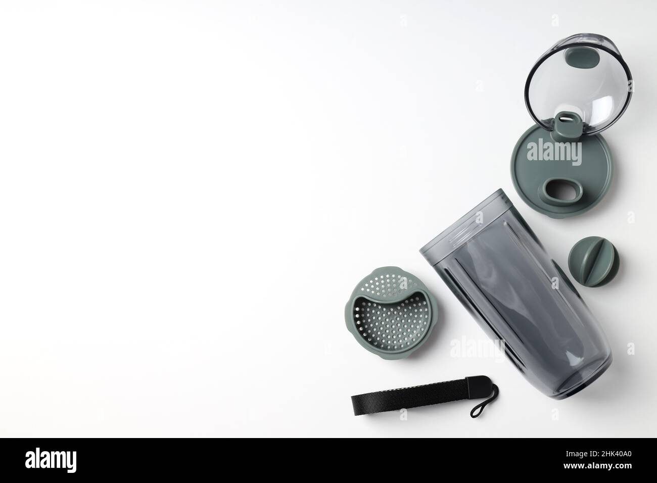 Sports shaker and accessories on white background Stock Photo - Alamy