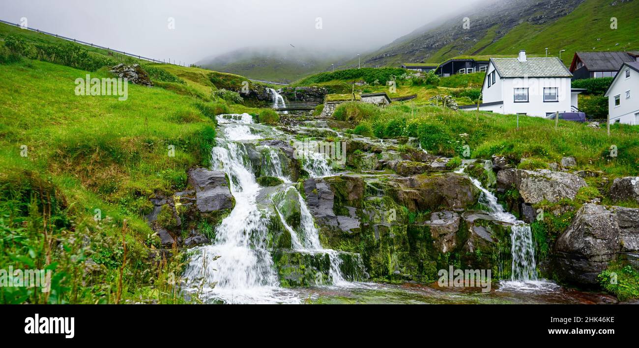 Typical small village in Faroe Islands. Tradicional faroese grass ...