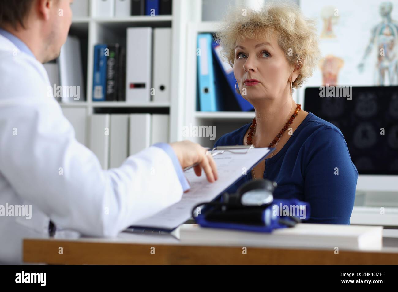 Gp doctor interview consultation hi-res stock photography and images ...