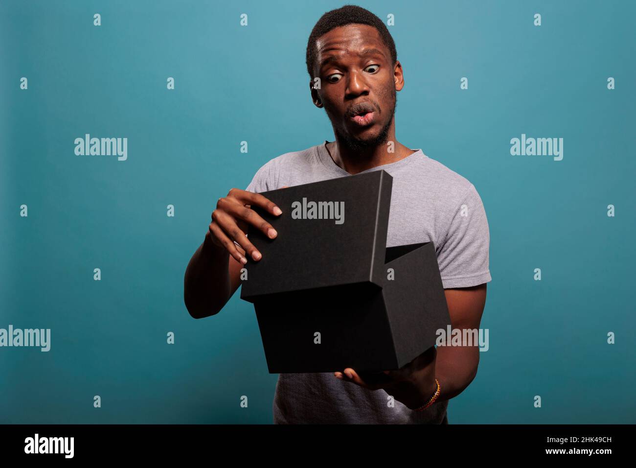 African man unpacking store hi-res stock photography and images - Alamy