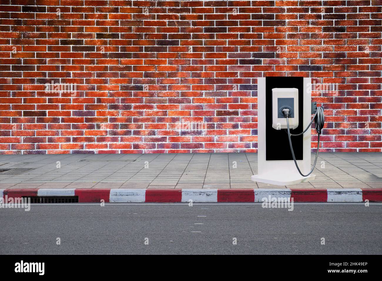 Electric chargers machine station on roadside of footpath for service ...
