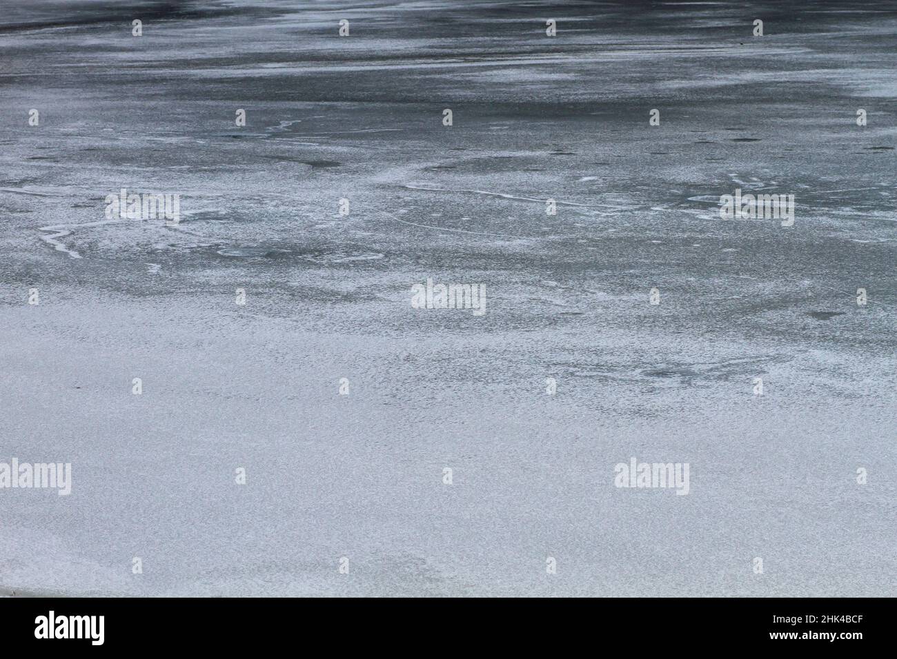 Freezing lake surface abstract background Stock Photo - Alamy