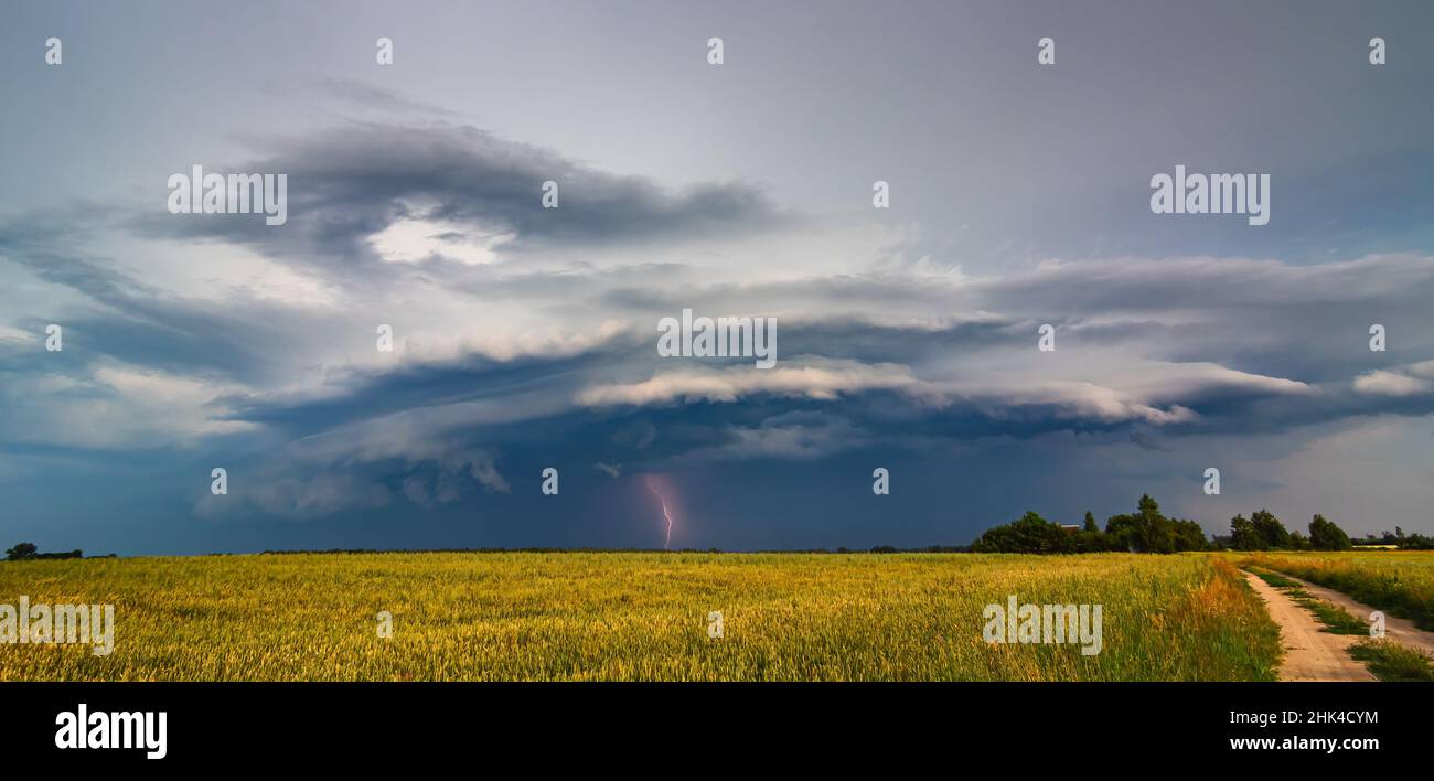 Thunder storm clouds with supercell wall cloud and lightning, summer ...