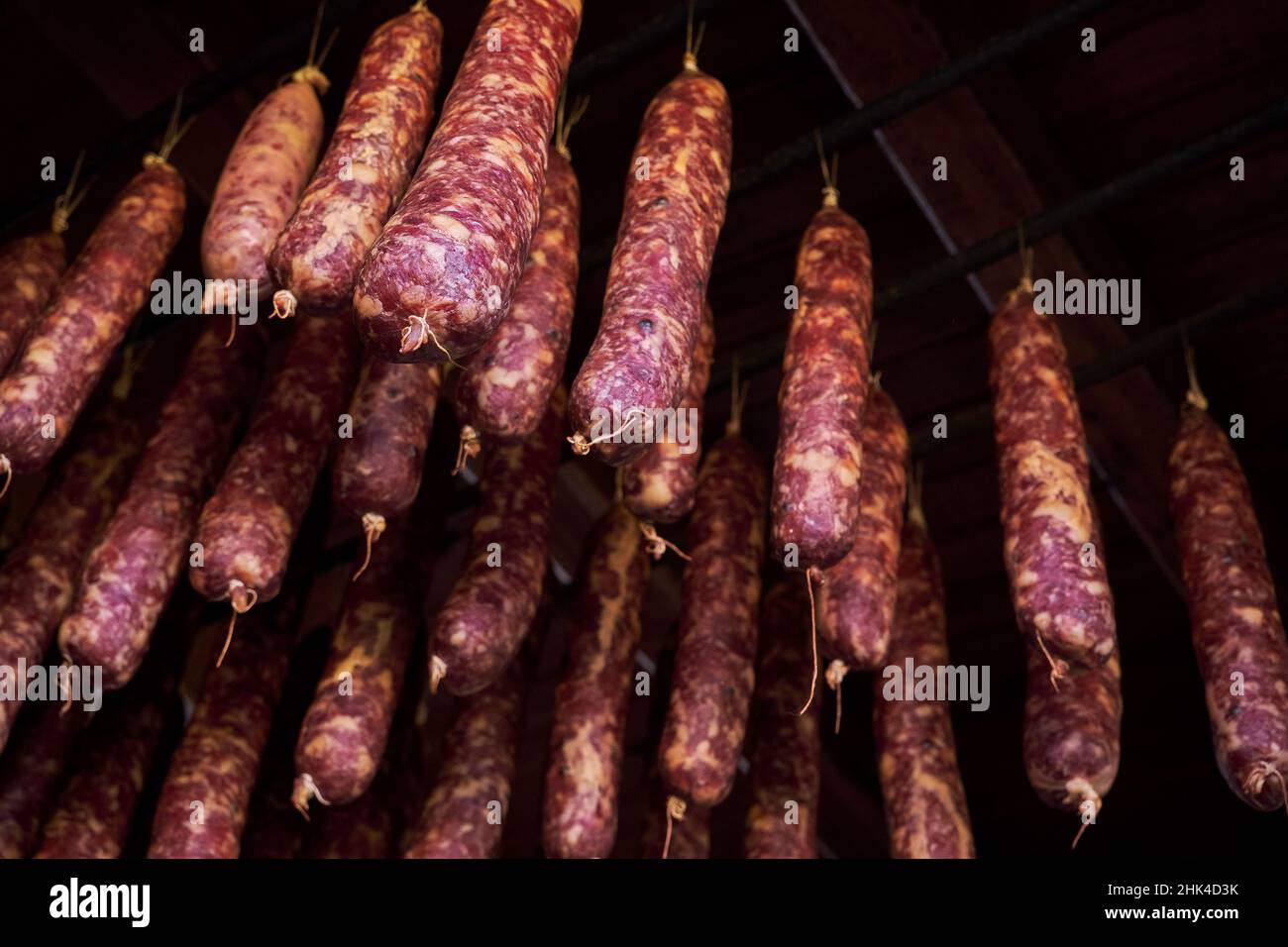 Traditional homemade saucissons hanging to dry Stock Photo - Alamy