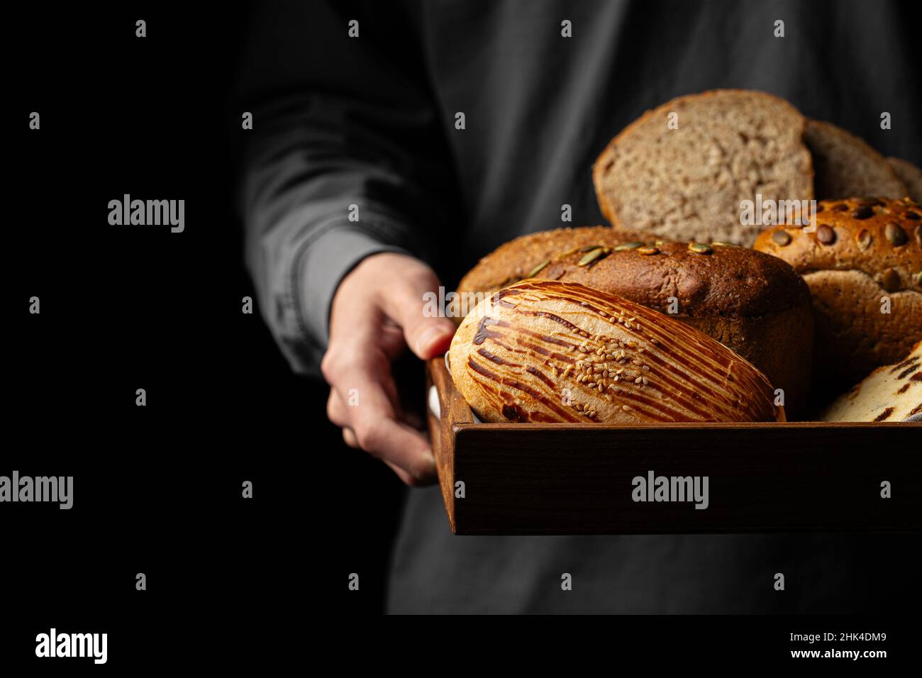 Hands holding food tray hi-res stock photography and images - Alamy