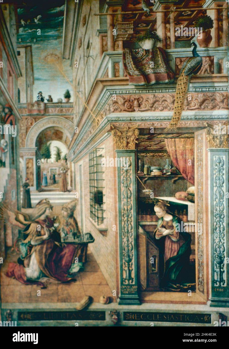 The Annunciation, with Saint Emidius, painting by Italian artist Carlo Crivelli, 1486 Stock ...